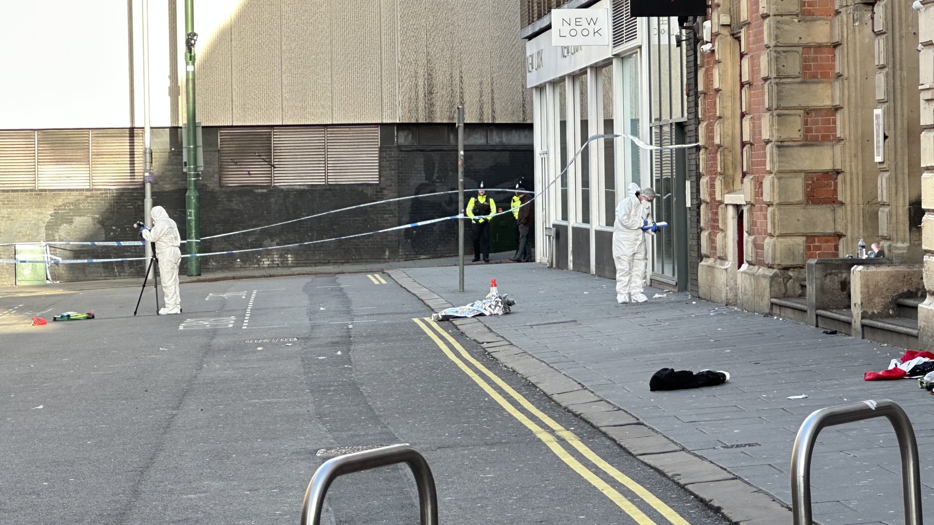 Forensics teams on scene of double stabbing on New Year's Day in ...