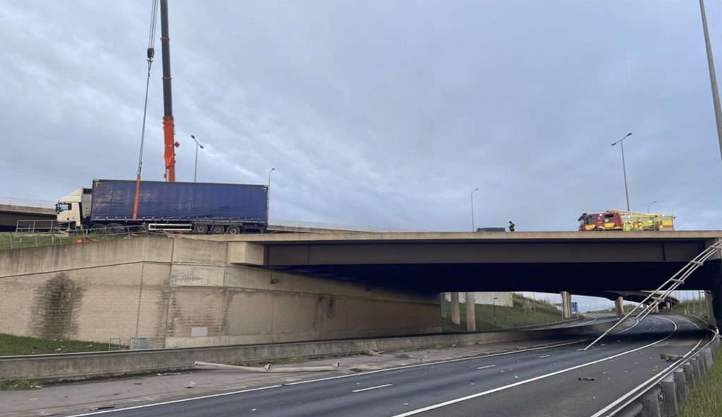 Live updates: M1 southbound J20 closed after HGV hits barrier and is ...